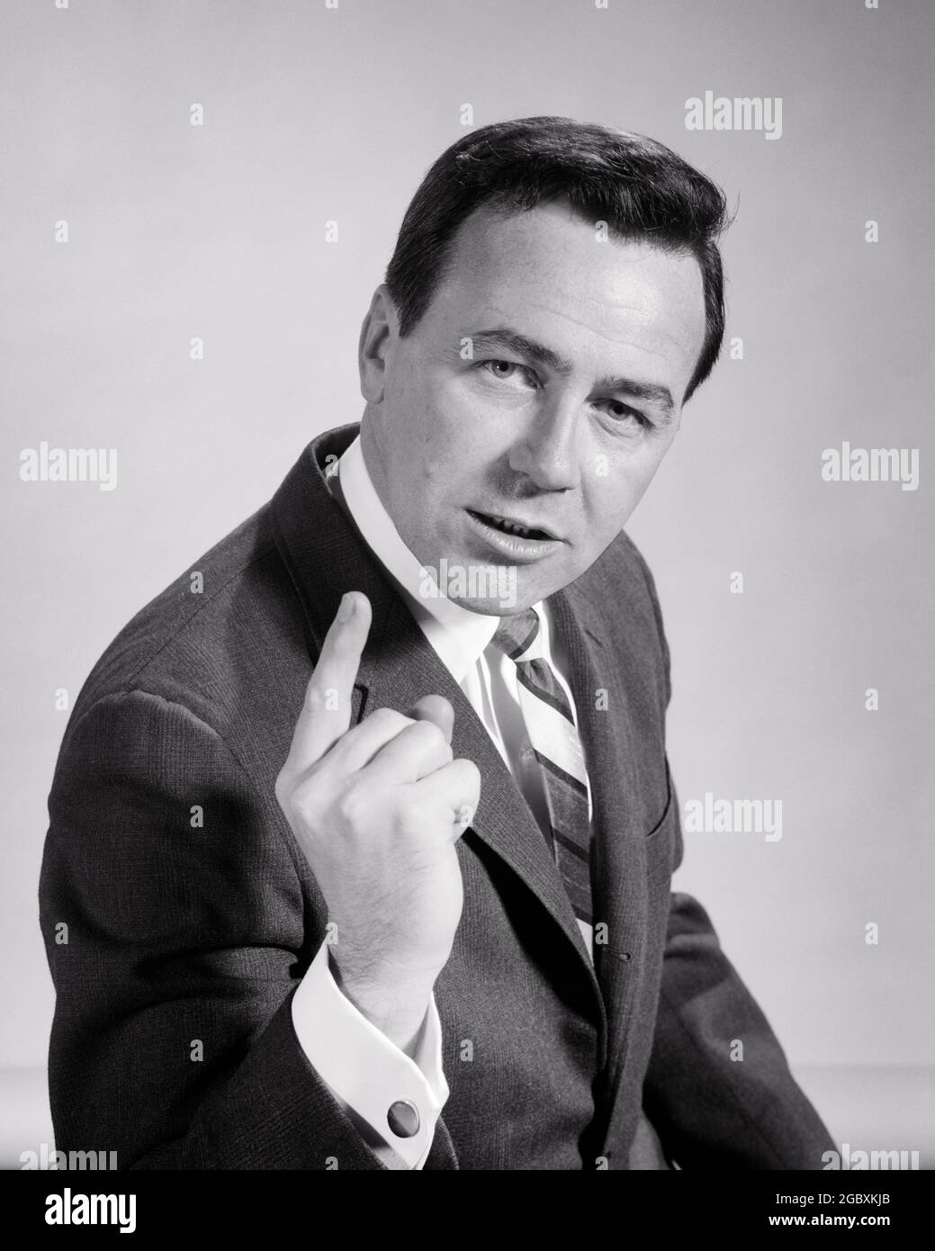 1960s ANGRY BUSINESS MAN POINTING FINGER MAKING A POINT EXPRESSING AN ...