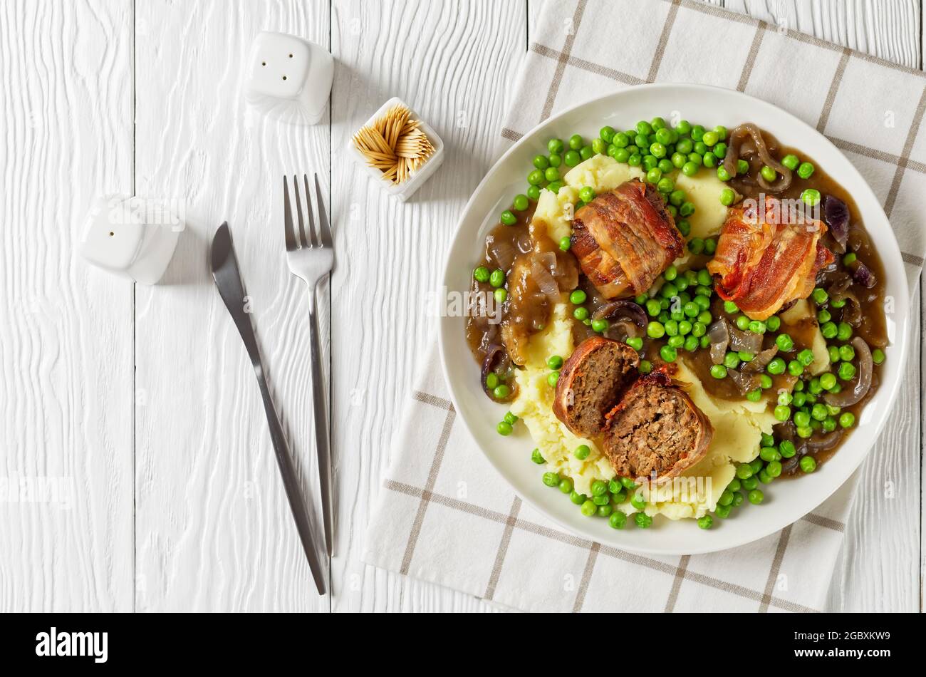baked faggots, english meatballs with creamy mashed potatoes, green ...