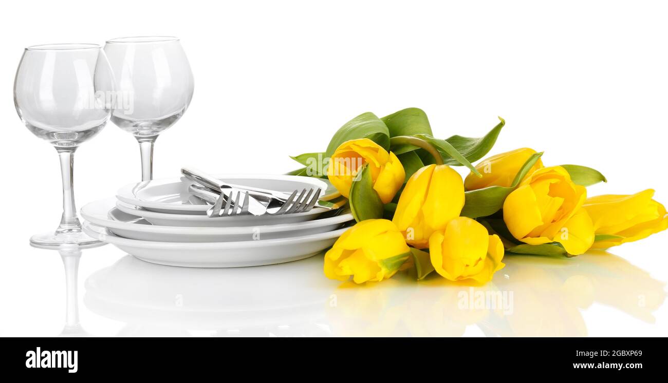Yellow tulips and utensils for serving isolated on white Stock Photo ...