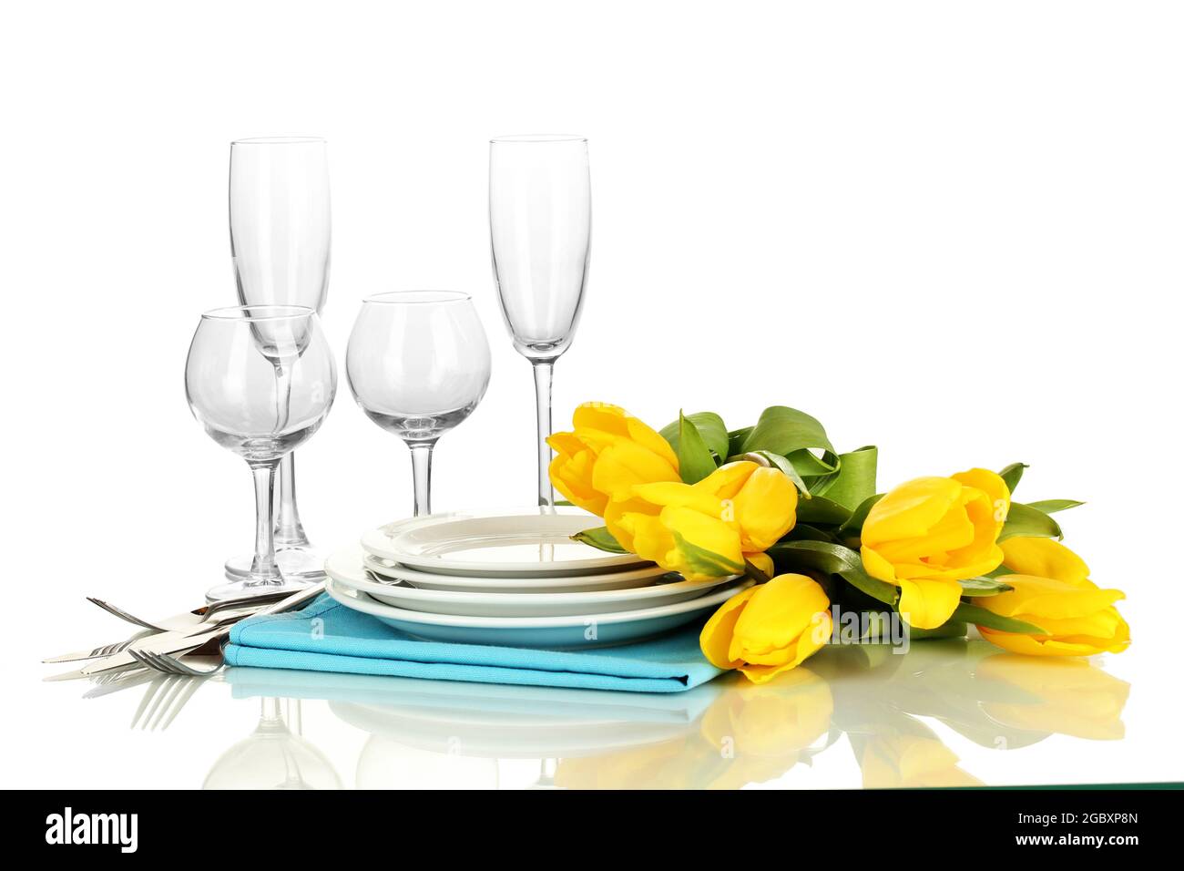Yellow tulips and utensils for serving isolated on white Stock Photo ...