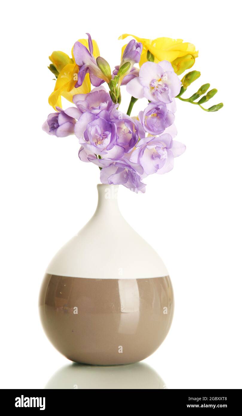 Beautiful bouquet of freesias in vase, isolated on white Stock Photo ...