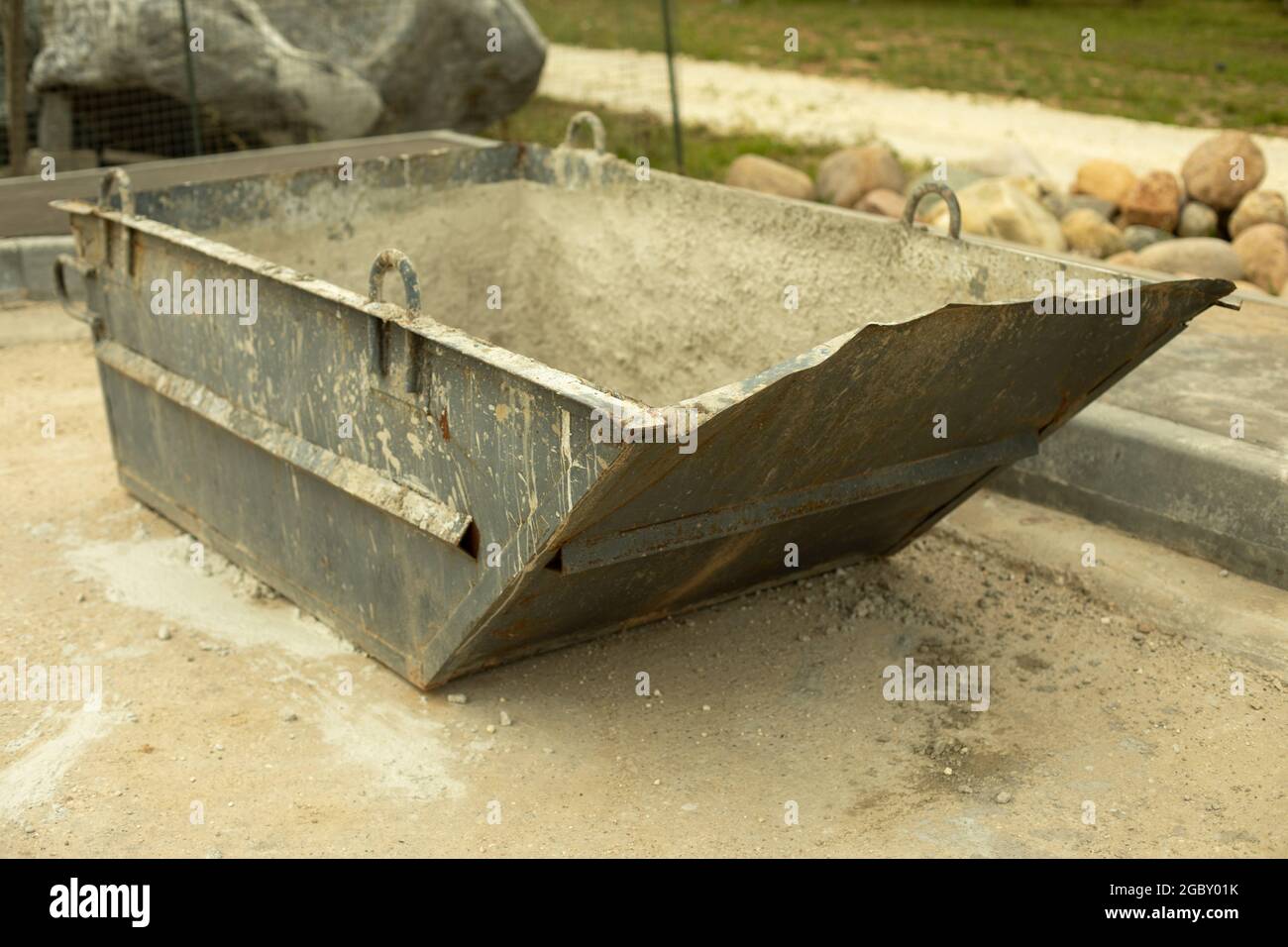 Capacity for cement mortar. Construction site container. Gray large box ...
