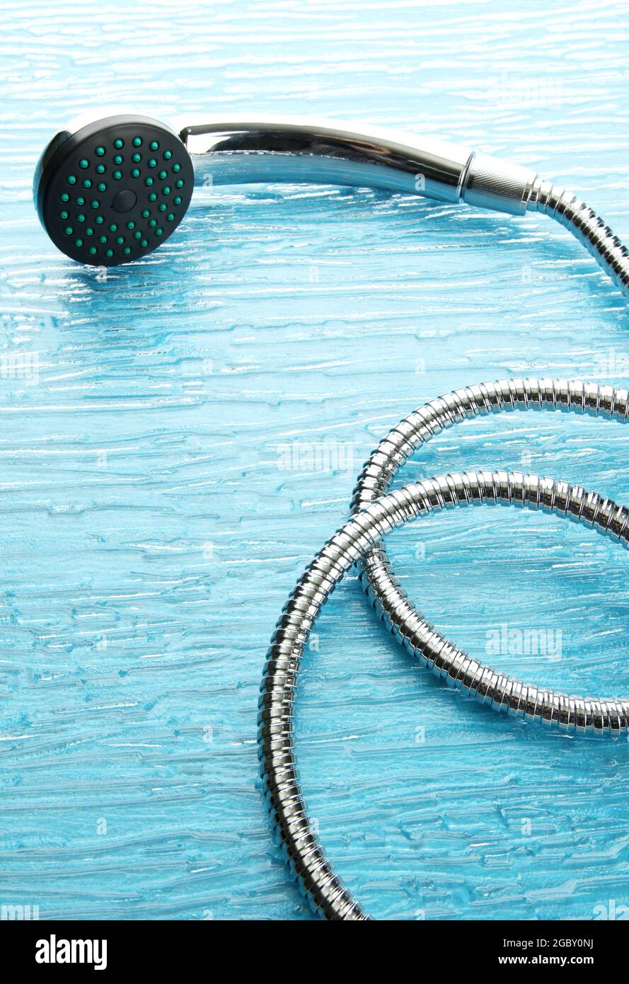 Shower on blue background Stock Photo - Alamy