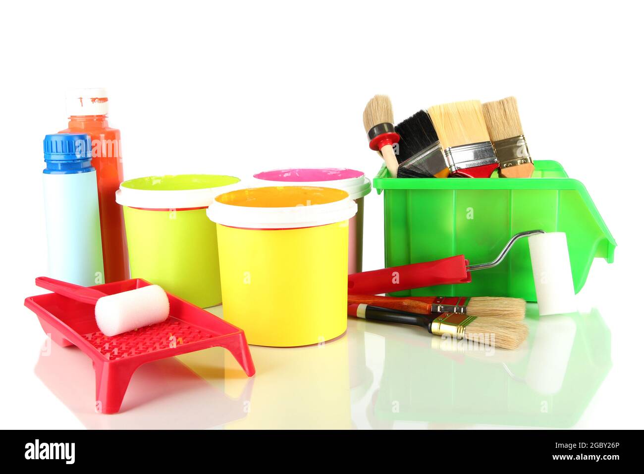Paint pots, paintbrushes and coloured swatches isolated on white Stock ...