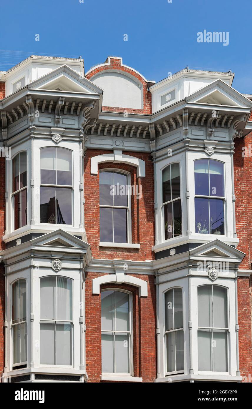 Old Victorian style exterior design windows of the house in old city ...