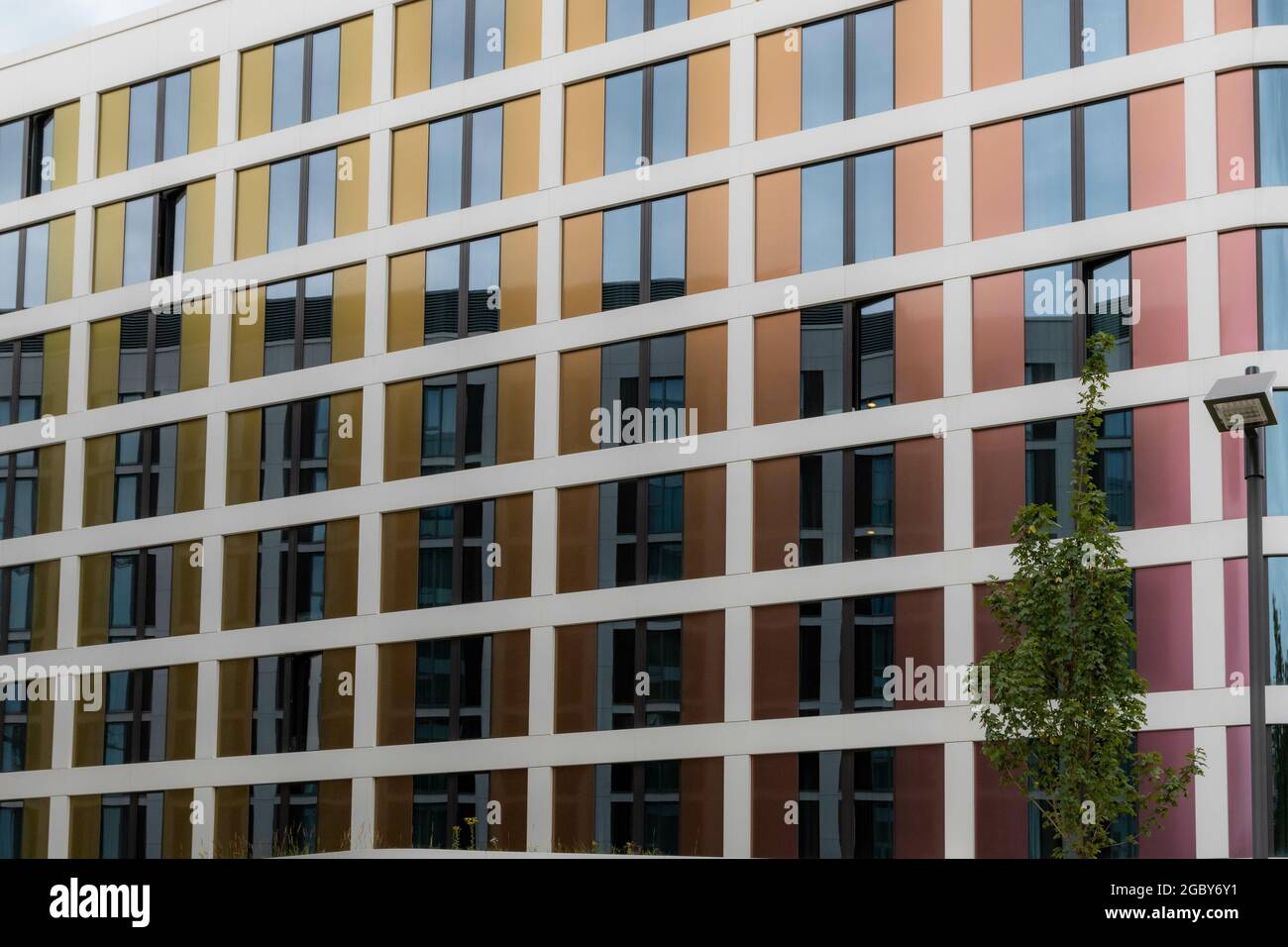 Background of a beautiful modern office building with yellow and blue ...