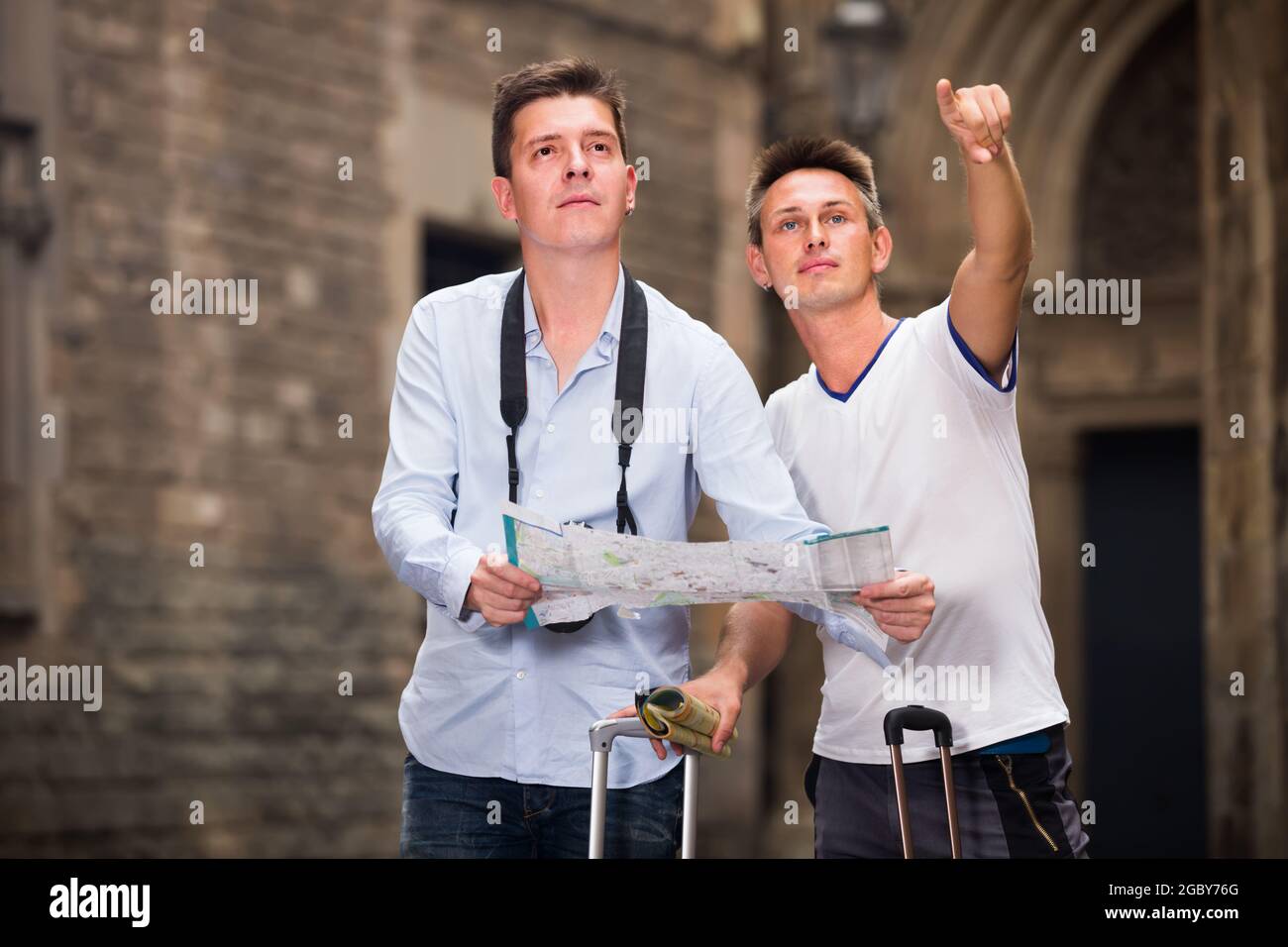Men planning journey map hi-res stock photography and images - Alamy