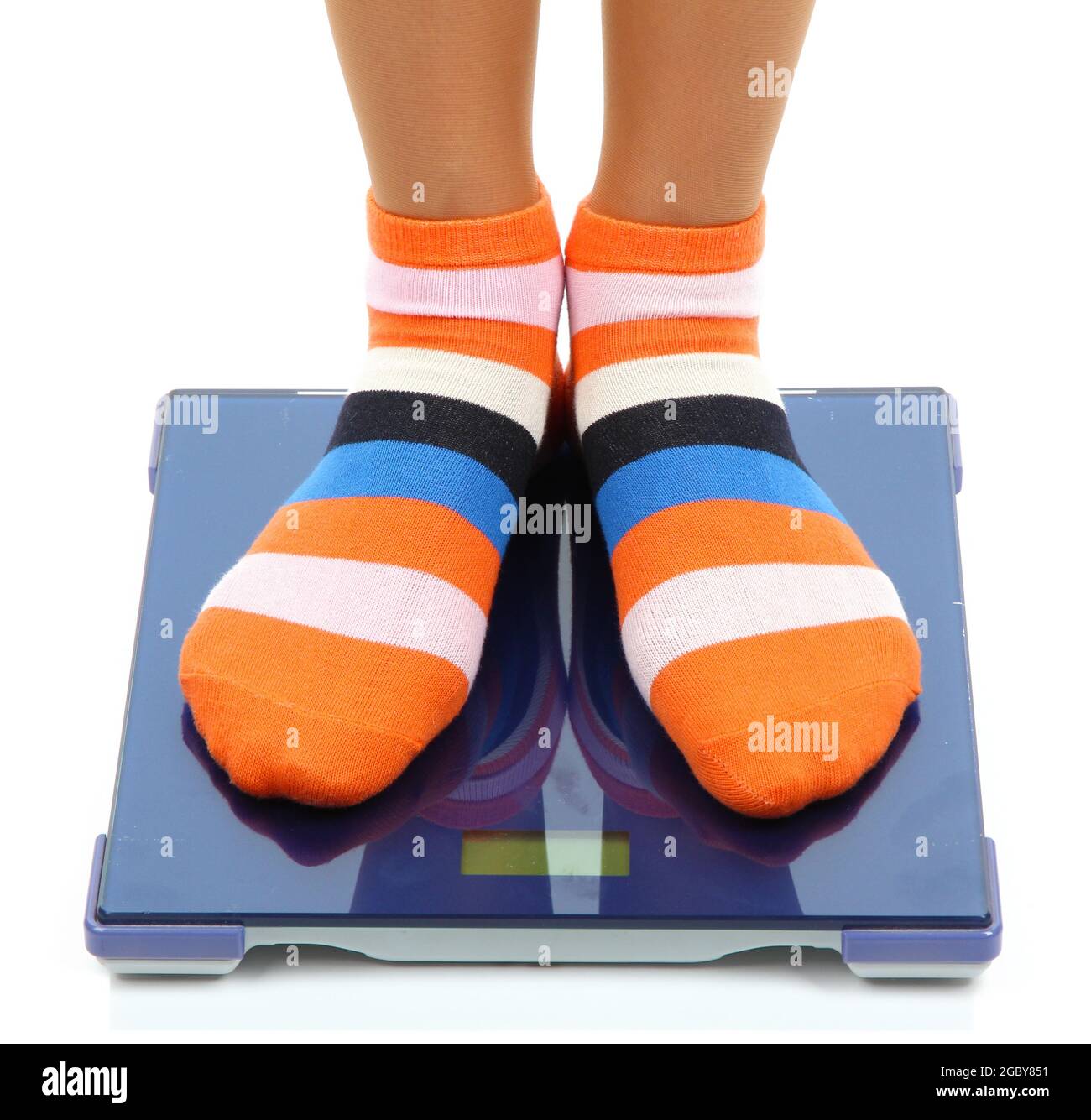 Weighing scales diet feet woman Cut Out Stock Images & Pictures - Alamy