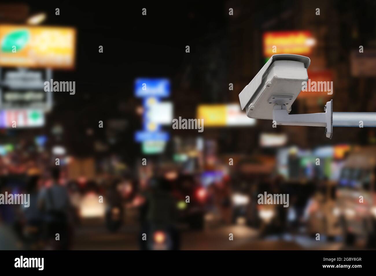 CCTV system on blur road at night background and have copy space for ...