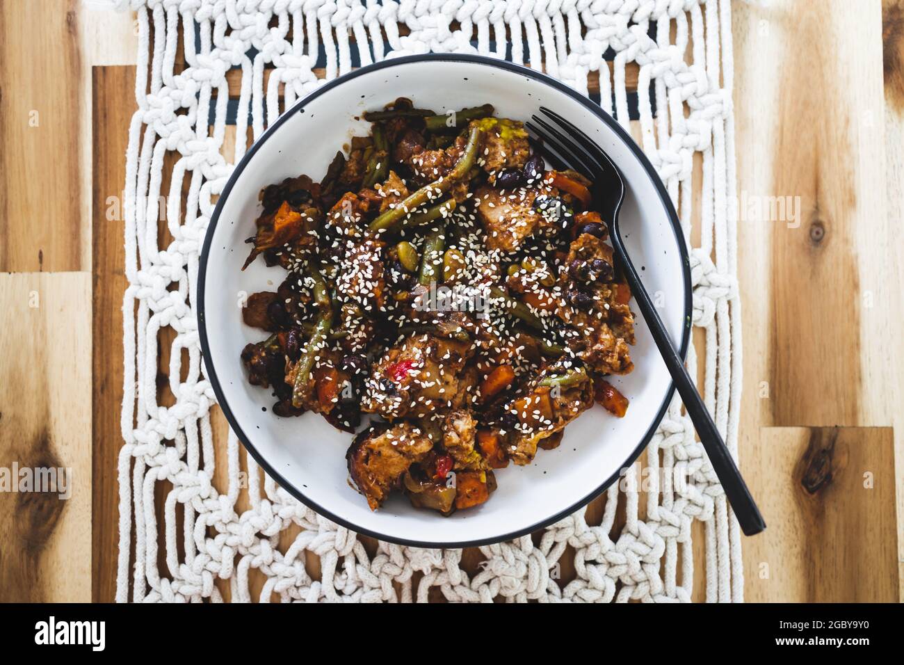 vegan roast with mixed vegetables and plant-based meatloaf slices ...