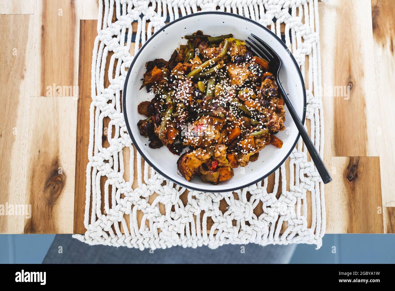 vegan roast with mixed vegetables and plant-based meatloaf slices ...