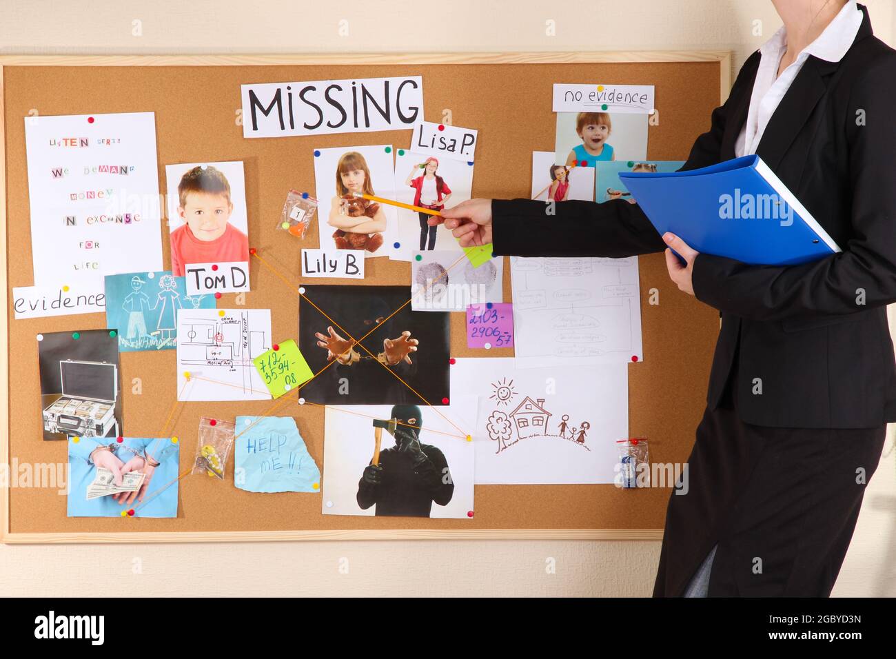 Detective investigating abduction of children Stock Photo - Alamy