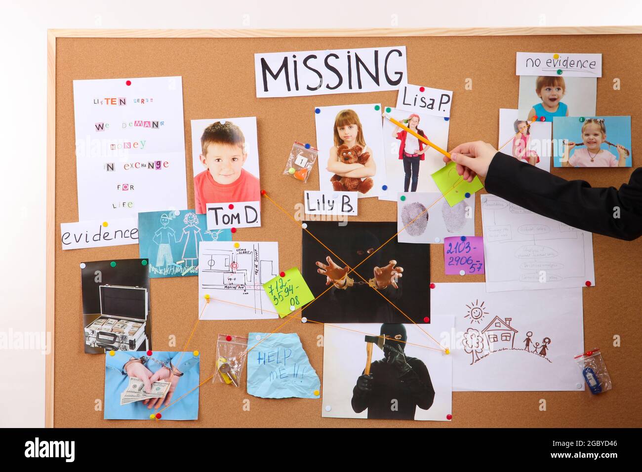 Detective investigating abduction of children Stock Photo - Alamy