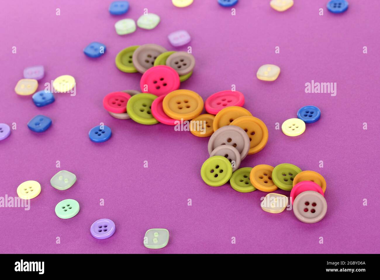 Bright color buttons on a purple background Stock Photo - Alamy