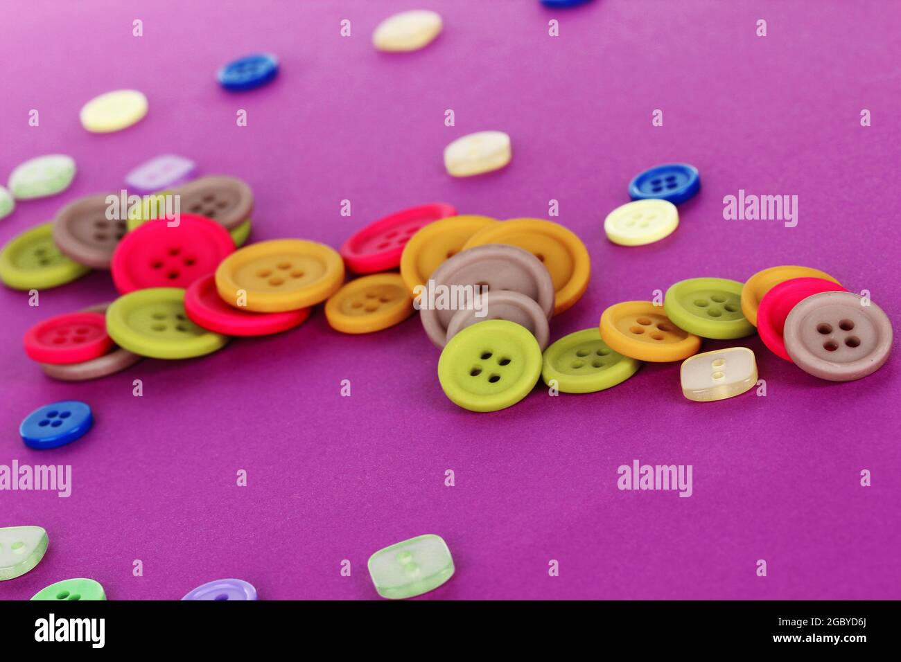 Bright color buttons on a purple background Stock Photo - Alamy