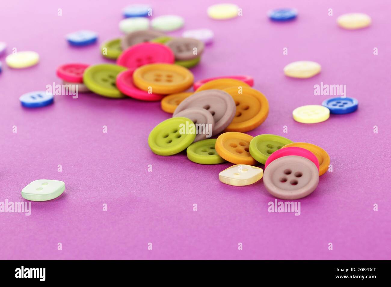 Bright color buttons on a purple background Stock Photo - Alamy