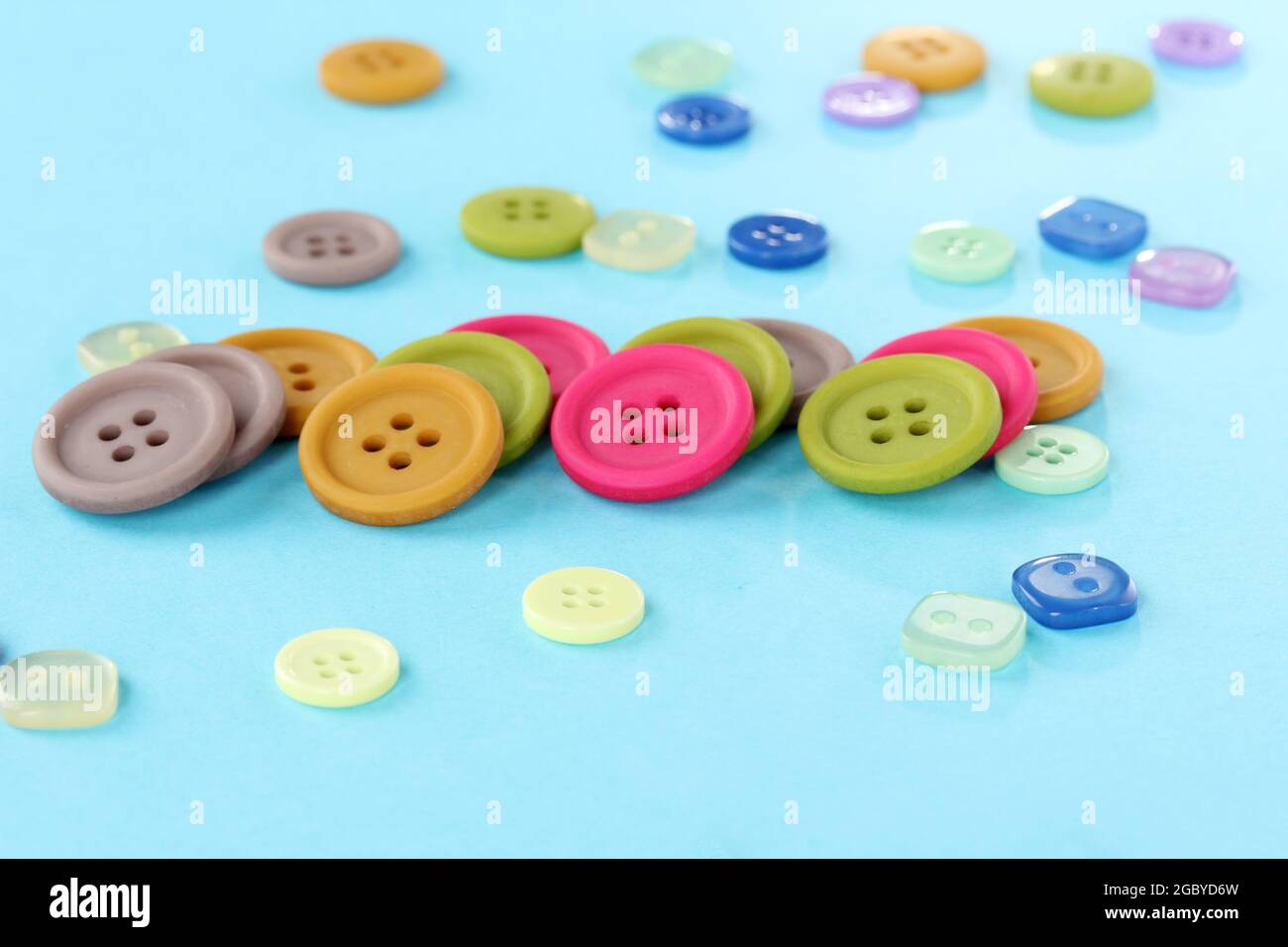 Bright color buttons on a blue background Stock Photo - Alamy