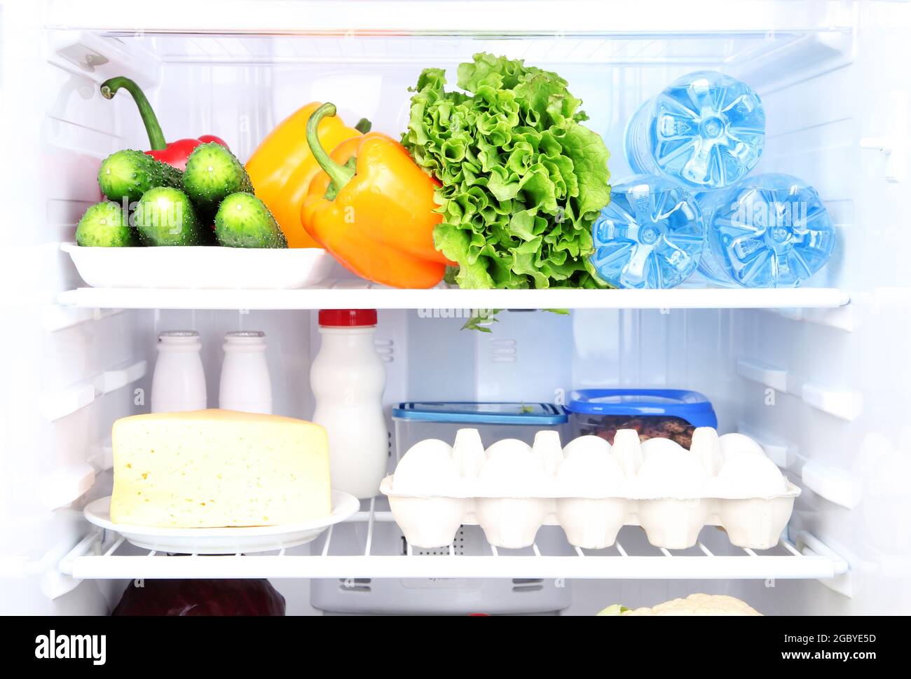 Refrigerator full of food Stock Photo - Alamy