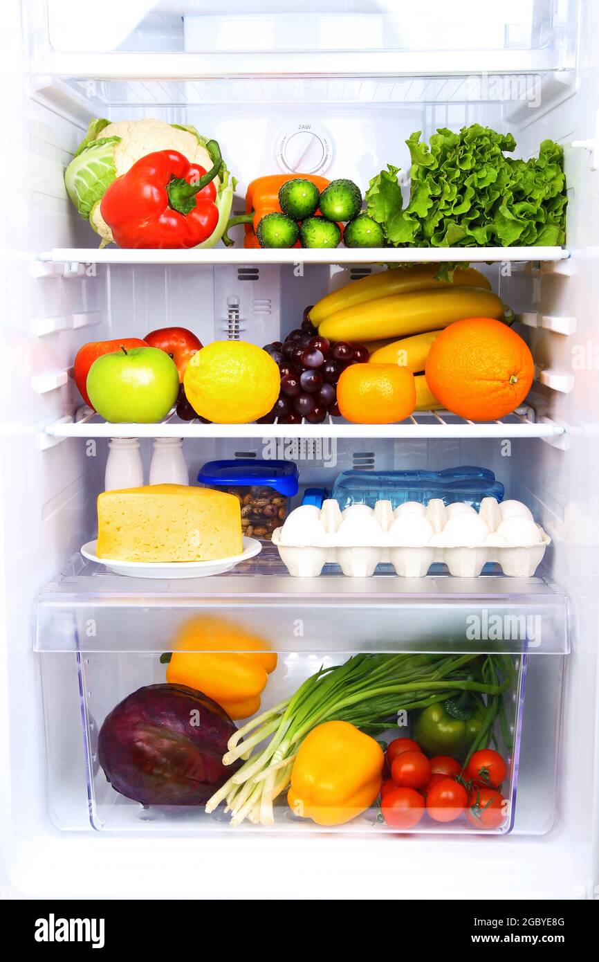 Refrigerator full of food Stock Photo - Alamy