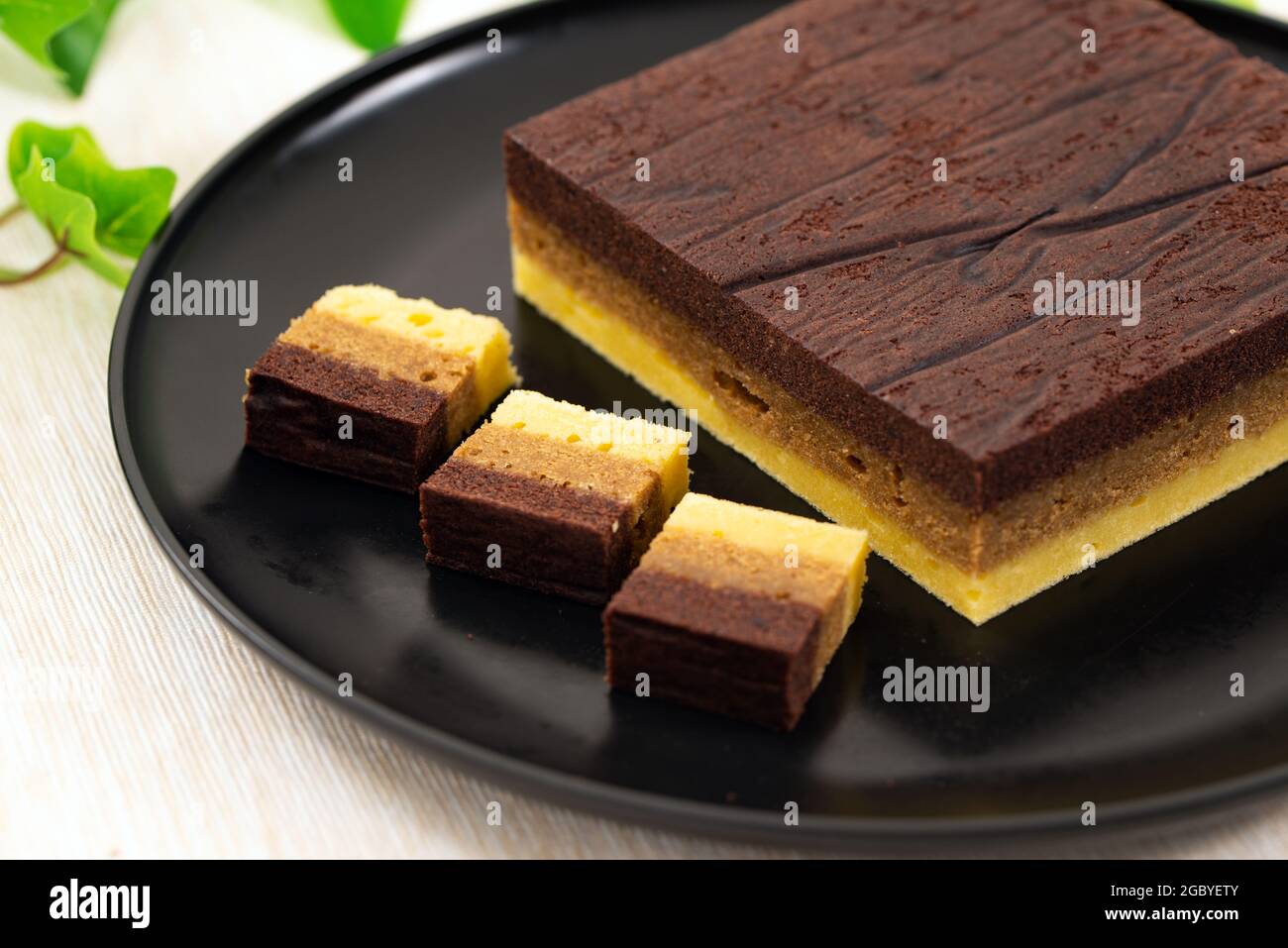 Three layer steam chocolate coffee cake Stock Photo - Alamy