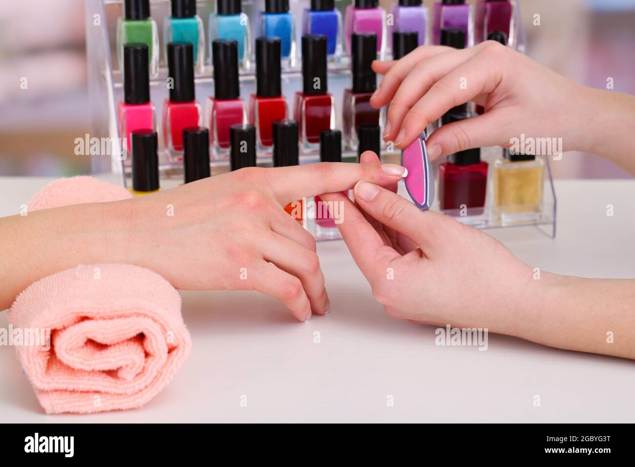 Manicure process in beauty salon, close up Stock Photo - Alamy