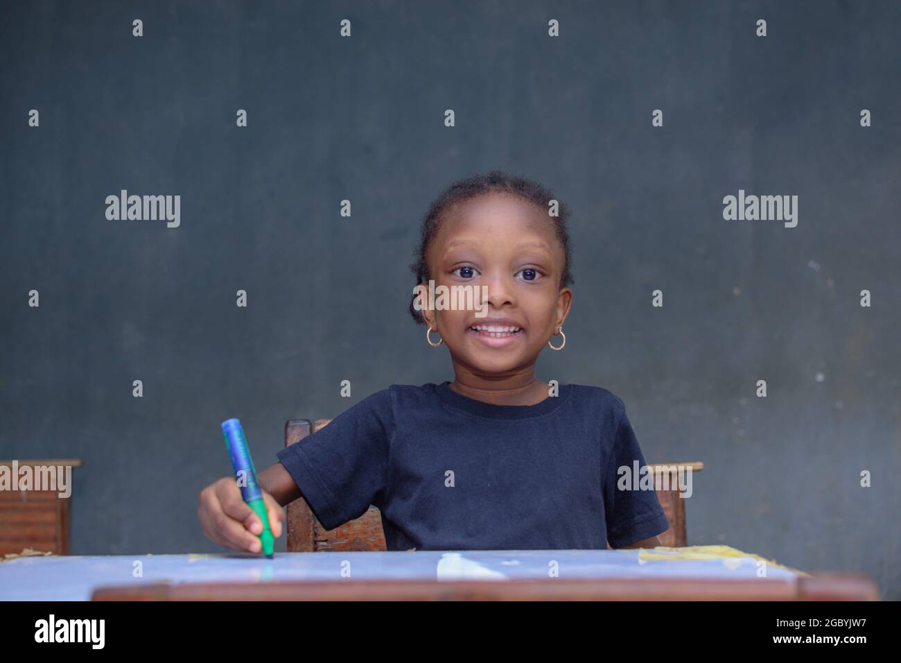 African school child in school writing hi-res stock photography and ...