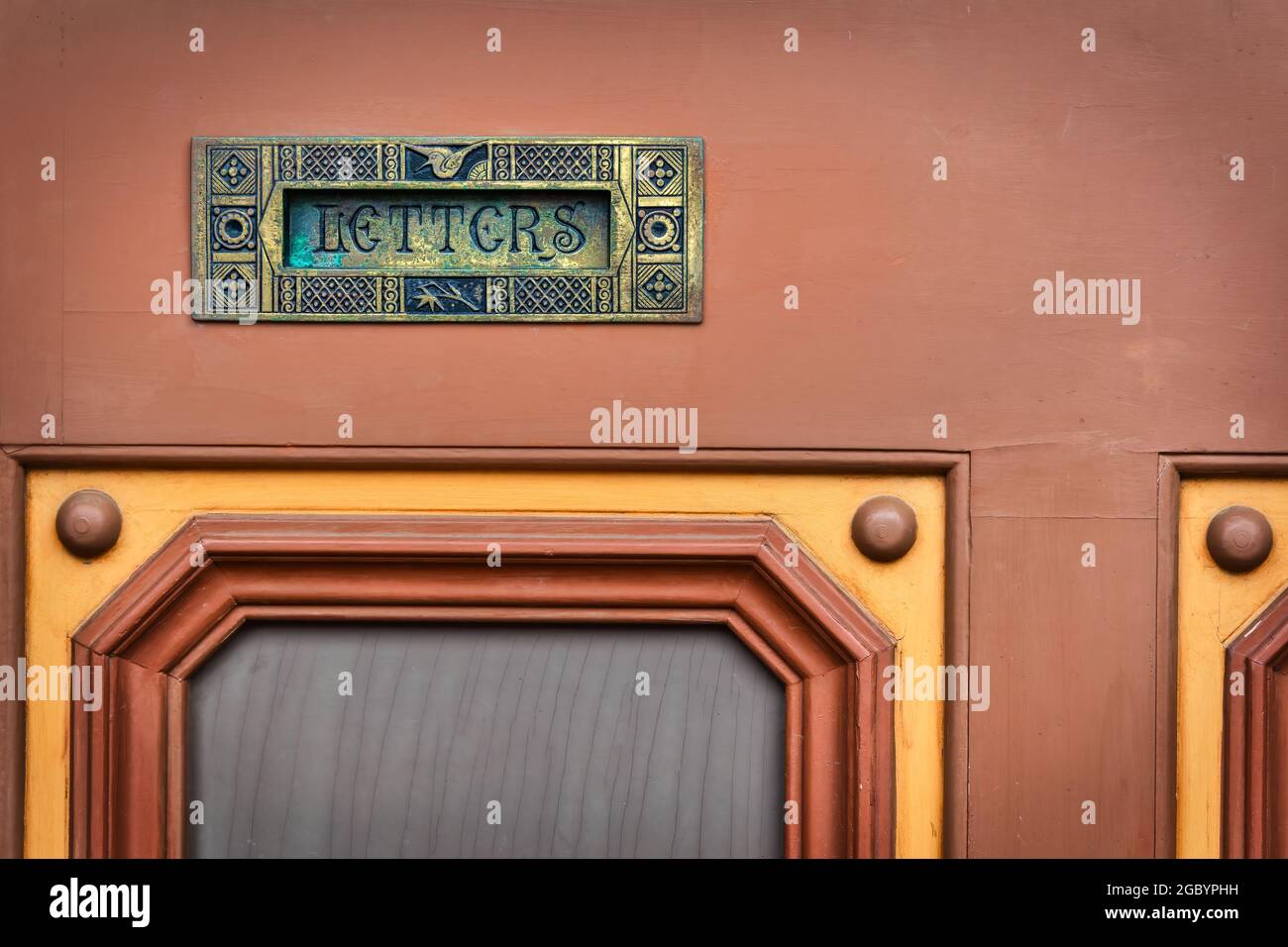 The mail slot for letters on a door in Osaka, Japan Stock Photo - Alamy