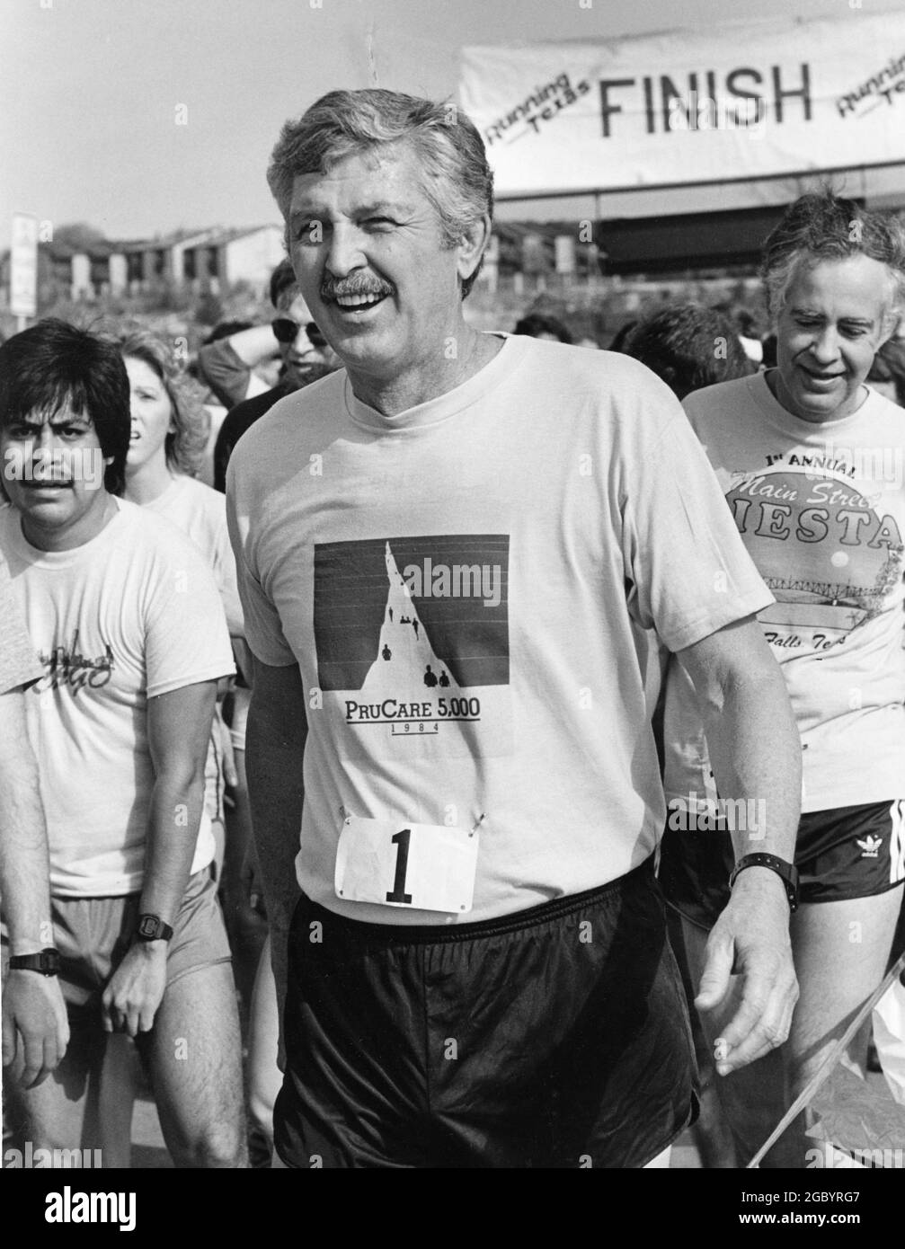 Austin Texas USA, circa 1991: White male runner crosses finish line at ...