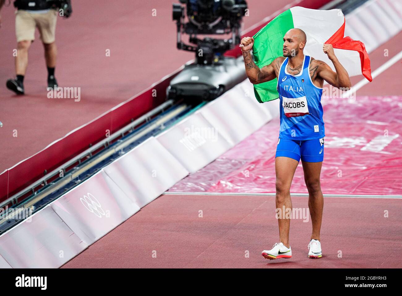 TOKYO, JAPAN - AUGUST 1: Lamont Marcel Jacobs of Italy celebrates his ...