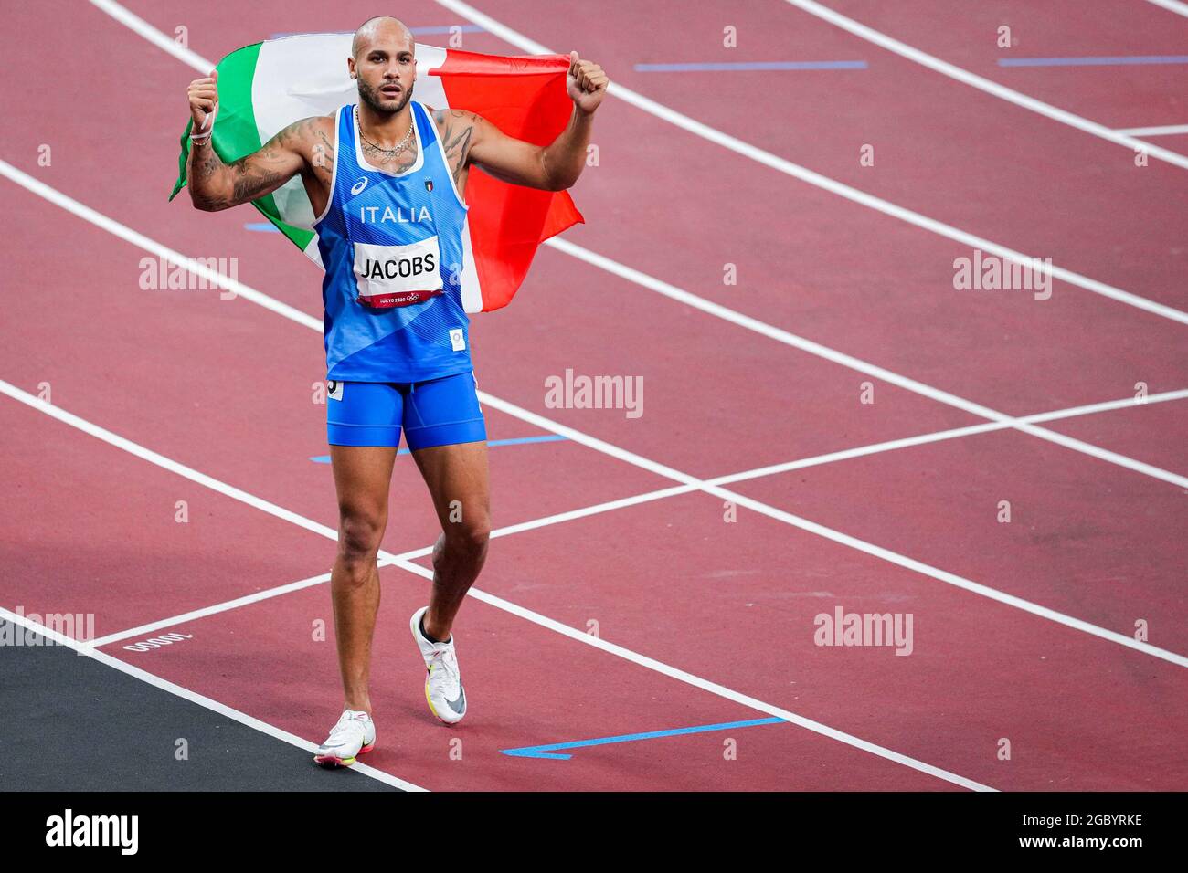 TOKYO, JAPAN - AUGUST 1: Lamont Marcel Jacobs of Italy celebrates his ...