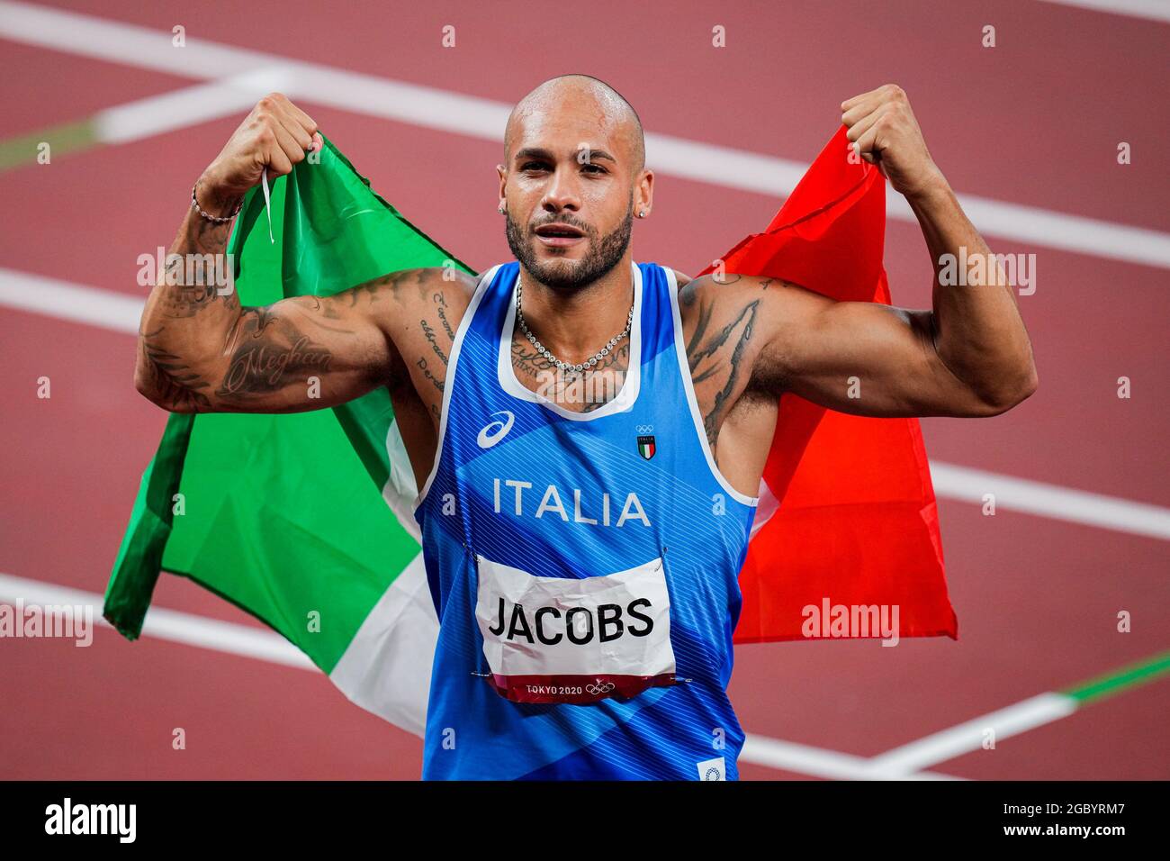 TOKYO, JAPAN - AUGUST 1: Lamont Marcel Jacobs of Italy celebrates his ...