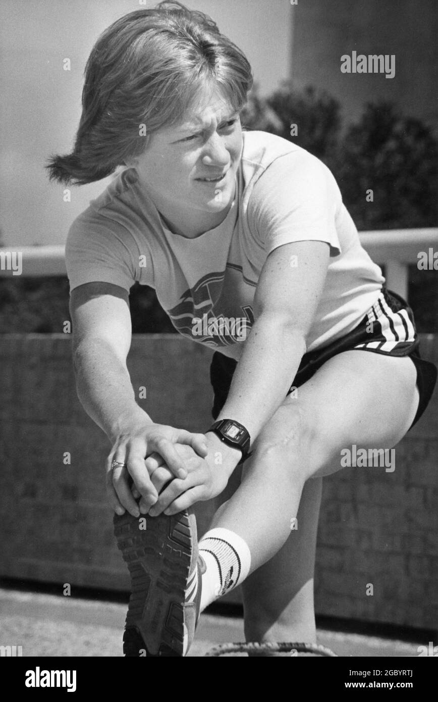 Austin, Texas USA, circa 1987: High school track athlete stretching ...