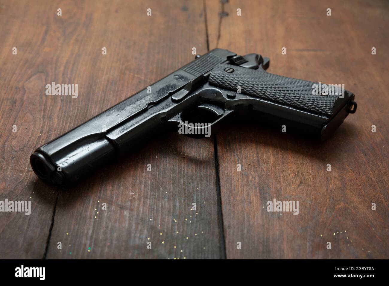 Hand gun on table hi-res stock photography and images - Alamy