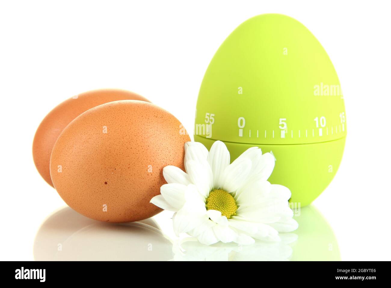 Green egg timer and eggs, isolated on white Stock Photo - Alamy