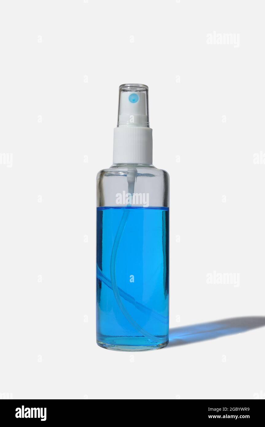 Blue alcohol in spray bottle, Alcohol spray for hand washing isolated ...