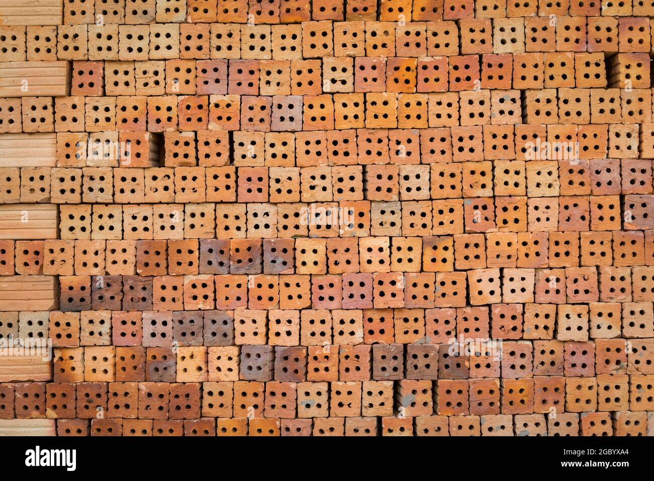 Red brick block for wallpaper and background Stock Photo - Alamy