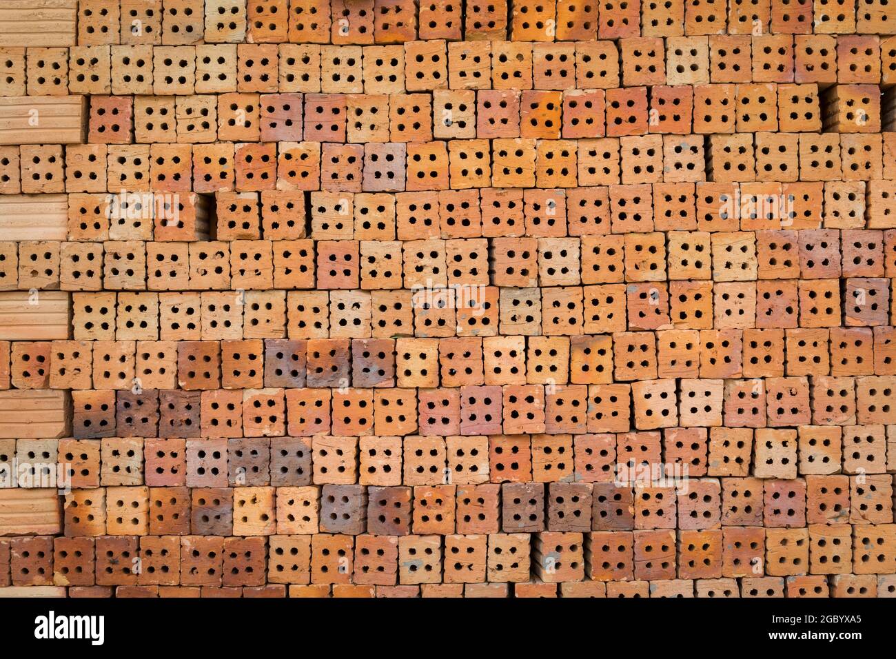 Red brick block for wallpaper and background Stock Photo - Alamy
