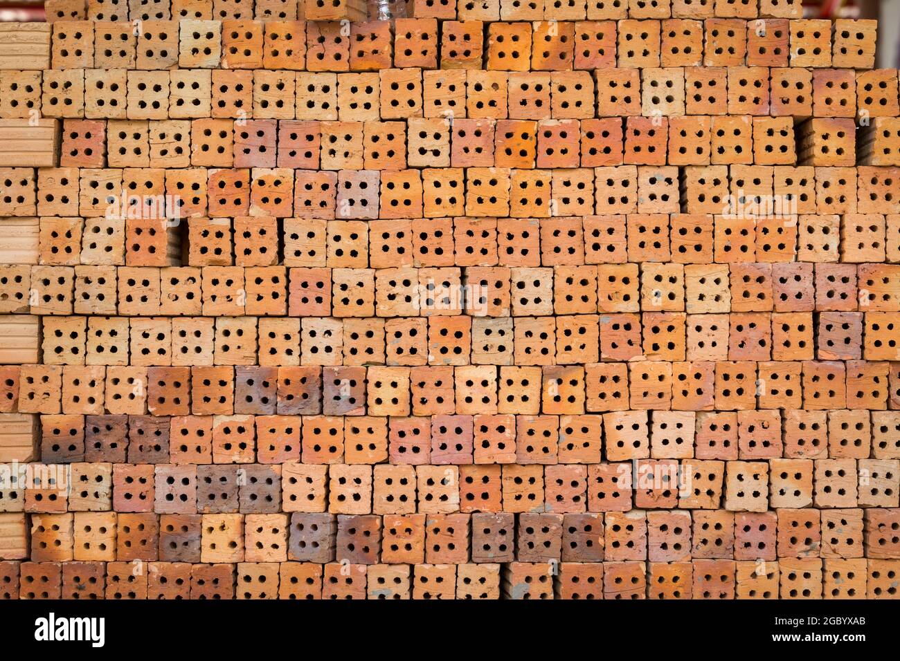 Red brick block for wallpaper and background Stock Photo - Alamy