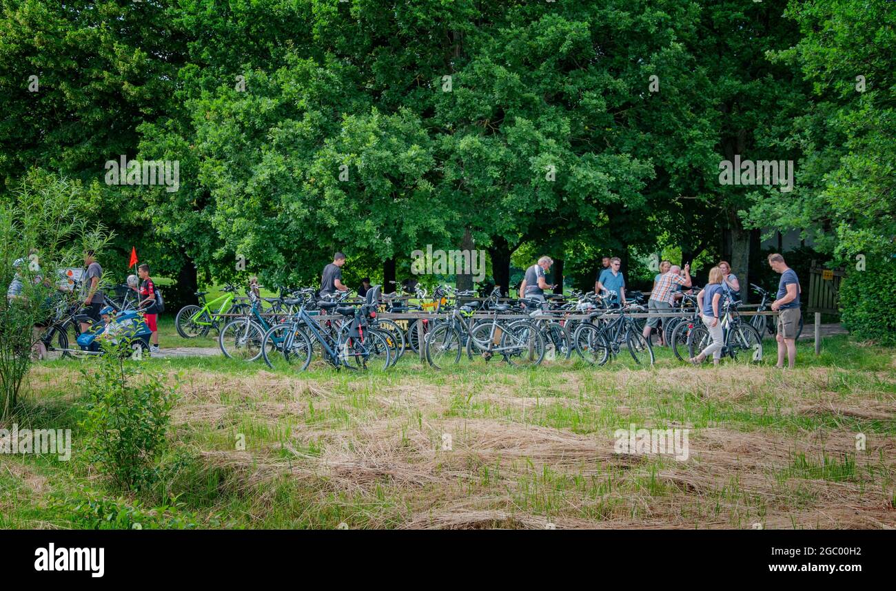 BIELEFELD, GERMANY. JUNE 20, 2021 Loheide park People ride bicycles ...