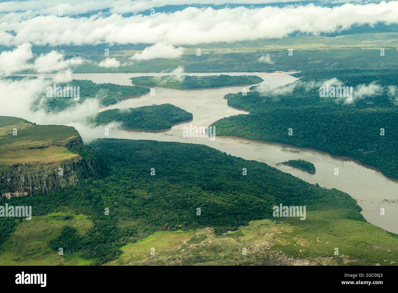 Aerial view of river Caroni and one of the tepuis (table mountains) in ...