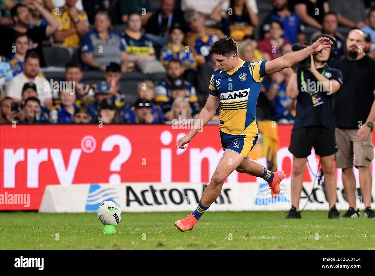 SYDNEY, AUSTRALIA - MARCH 27: Mitchell Moses of the Eels has a kick at ...