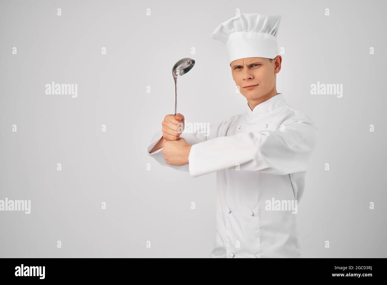 chef with a ladle in his hands Professional cooking restaurant Stock ...