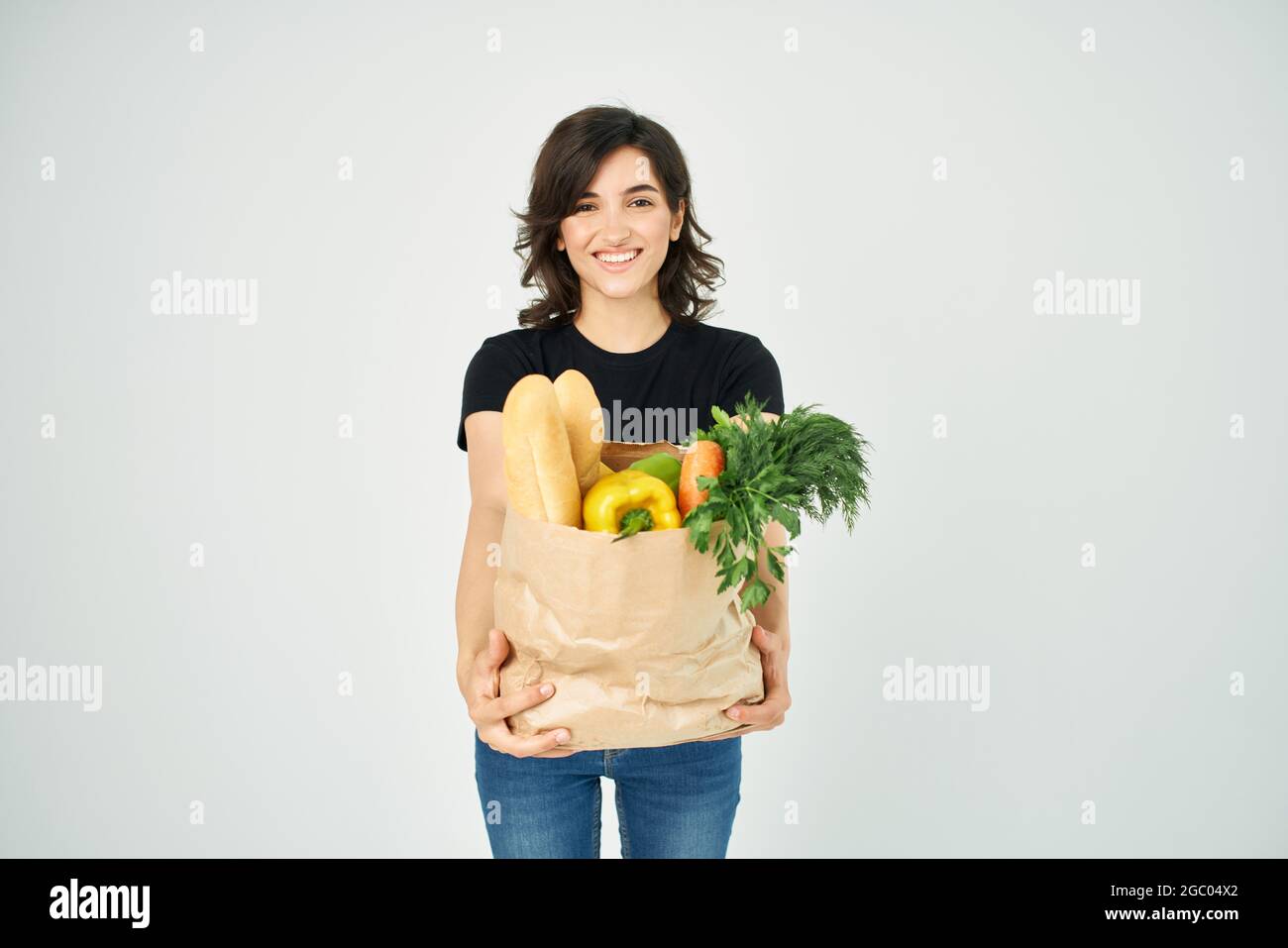 woman with package of groceries delivery service supermarket Stock ...