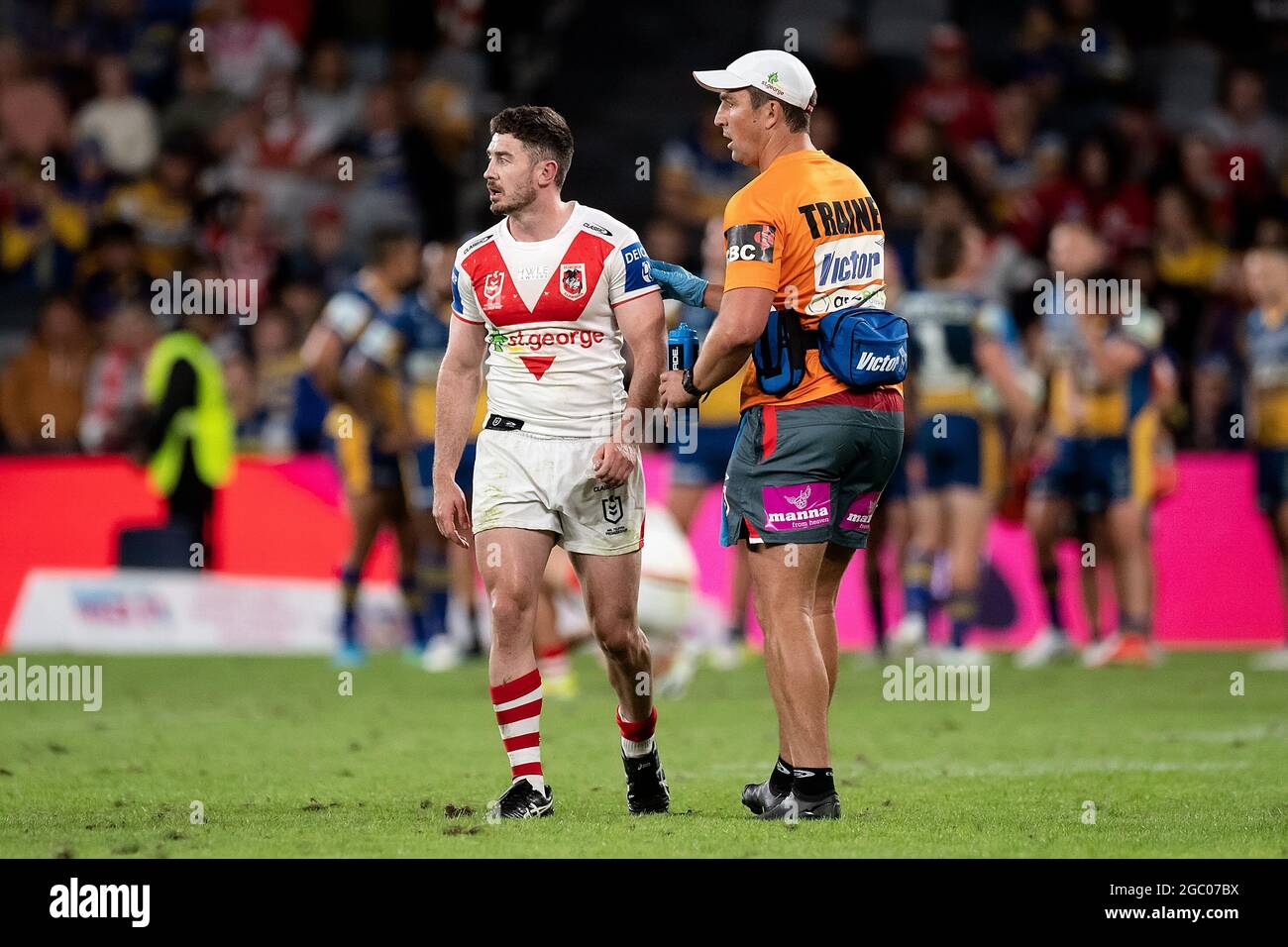 SYDNEY, AUSTRALIA - APRIL 11: Adam Clune of the Dragons is taken off ...