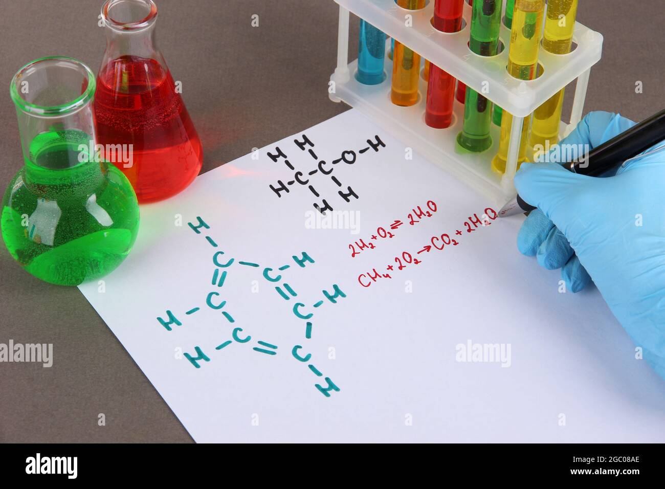 Hand scientist writing formulas Stock Photo - Alamy