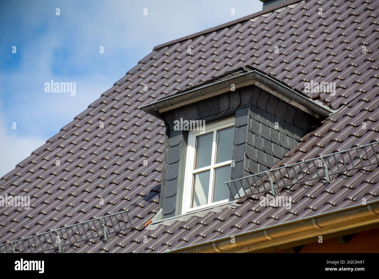 Slate cladded dormer on a new tiled roof Stock Photo - Alamy