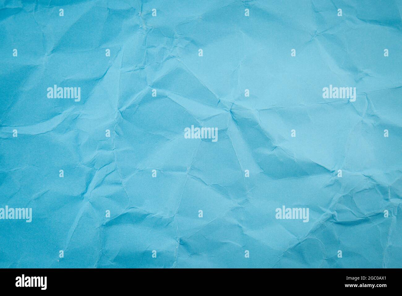 Blue crumpled paper texture background Stock Photo - Alamy