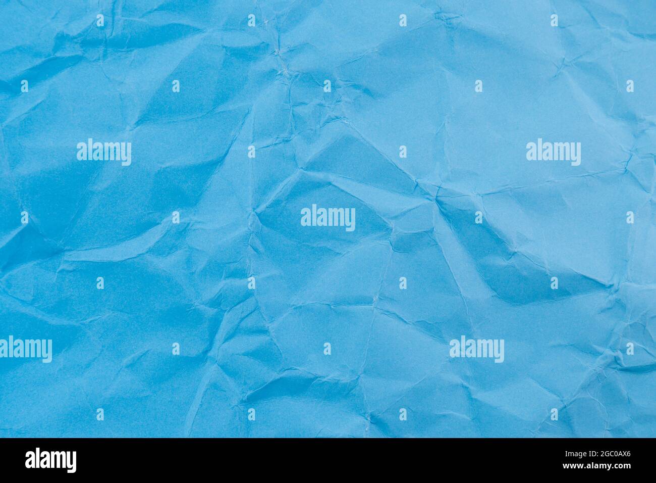 Blue crumpled paper texture background Stock Photo - Alamy