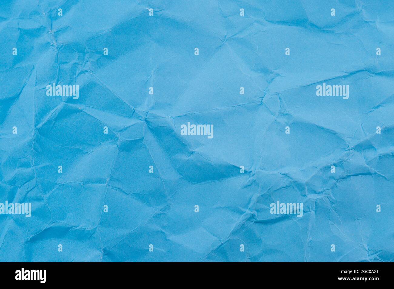 Blue crumpled paper texture background Stock Photo - Alamy