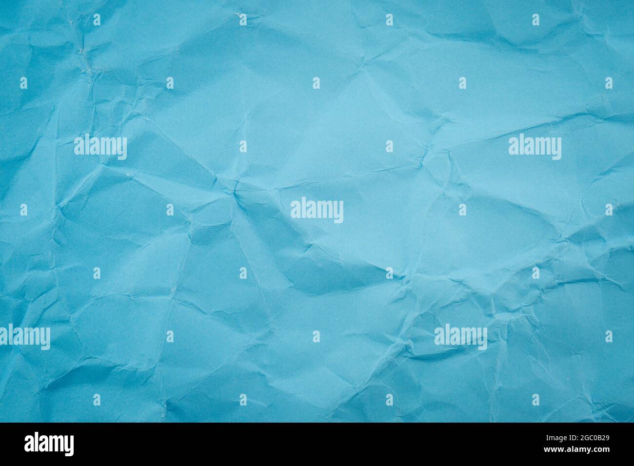 Blue crumpled paper texture background Stock Photo - Alamy